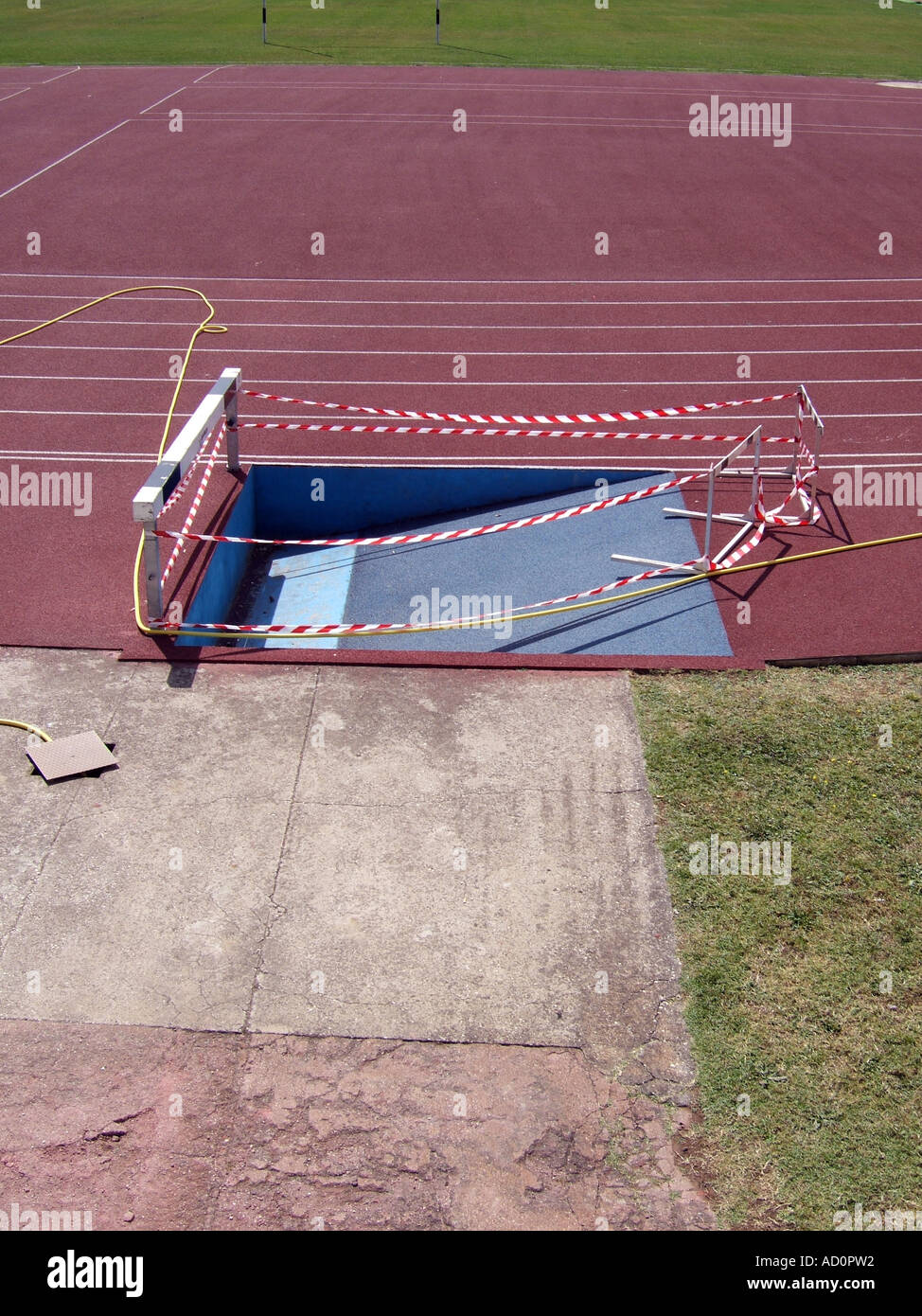 steeplechase hurdle water pit blocked with red and white tape Stock ...