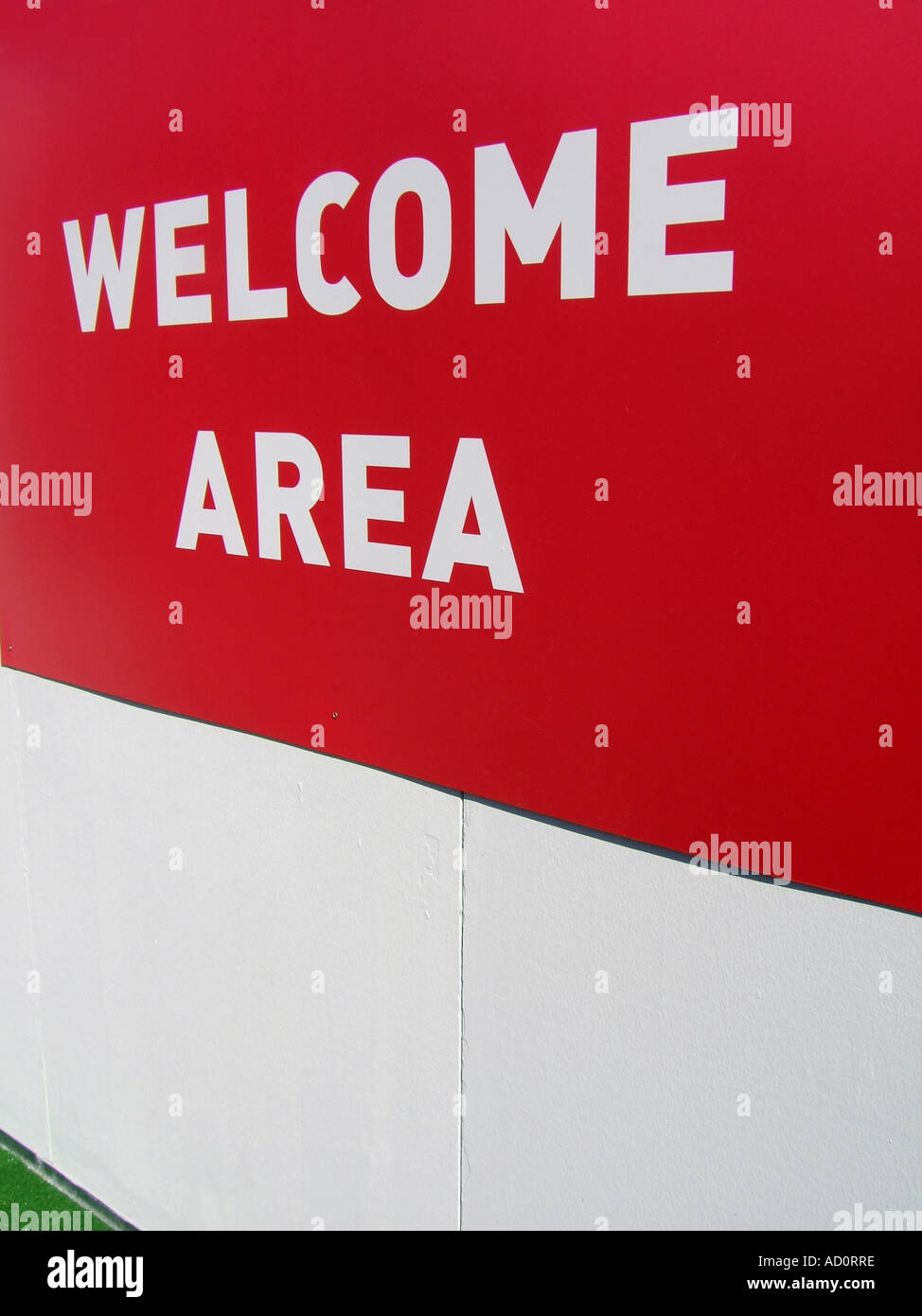 red welcome area sign at event Stock Photo - Alamy
