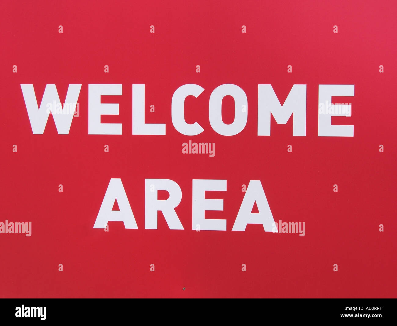 red welcome area sign at event Stock Photo - Alamy