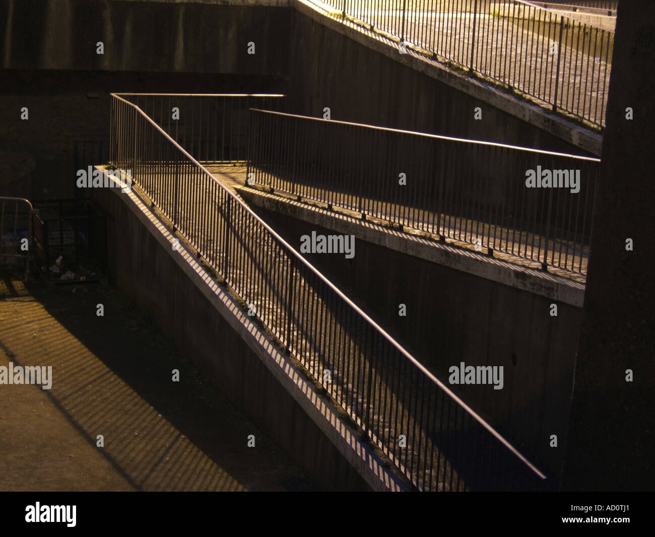 walkway with fence at night Stock Photo - Alamy