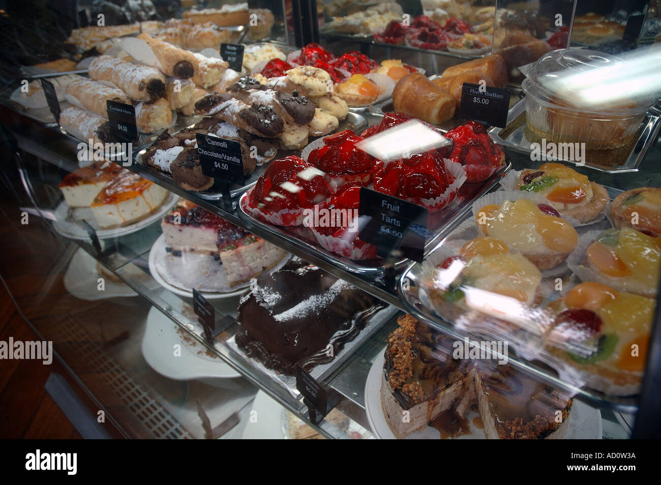 Delicious cakes and pastries in café window Stock Photo - Alamy