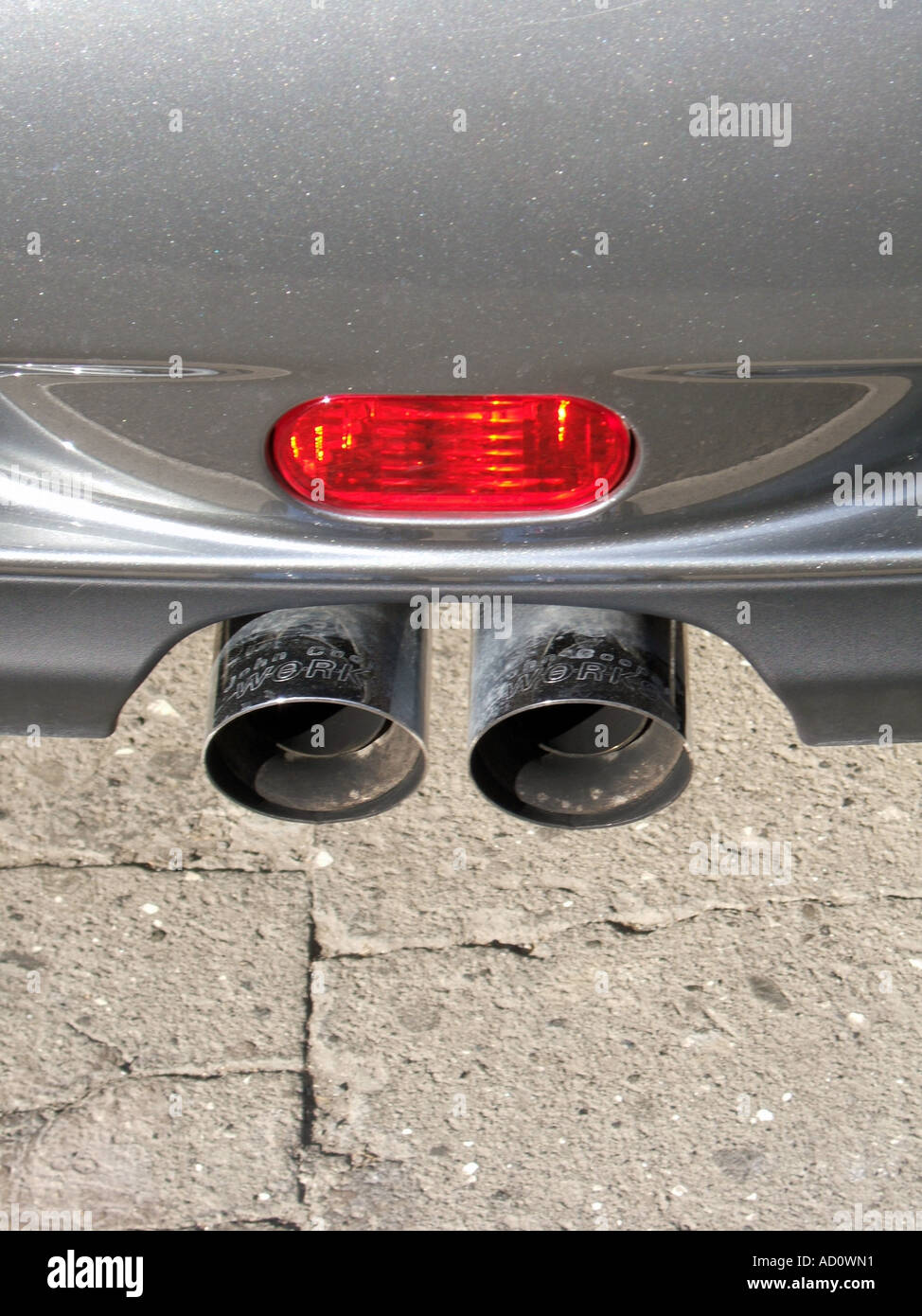 mini car exhaust Stock Photo - Alamy