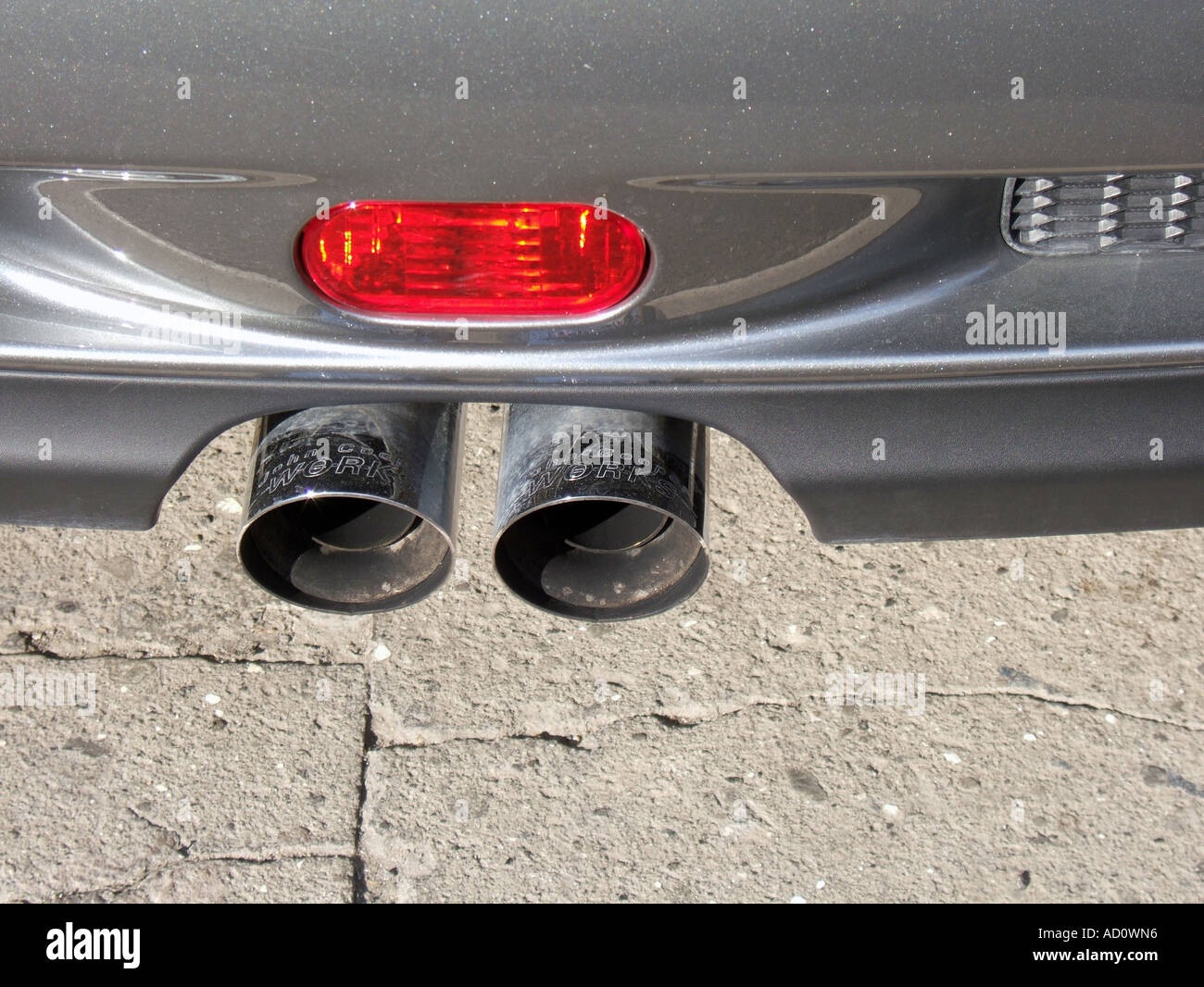 mini car exhaust Stock Photo - Alamy