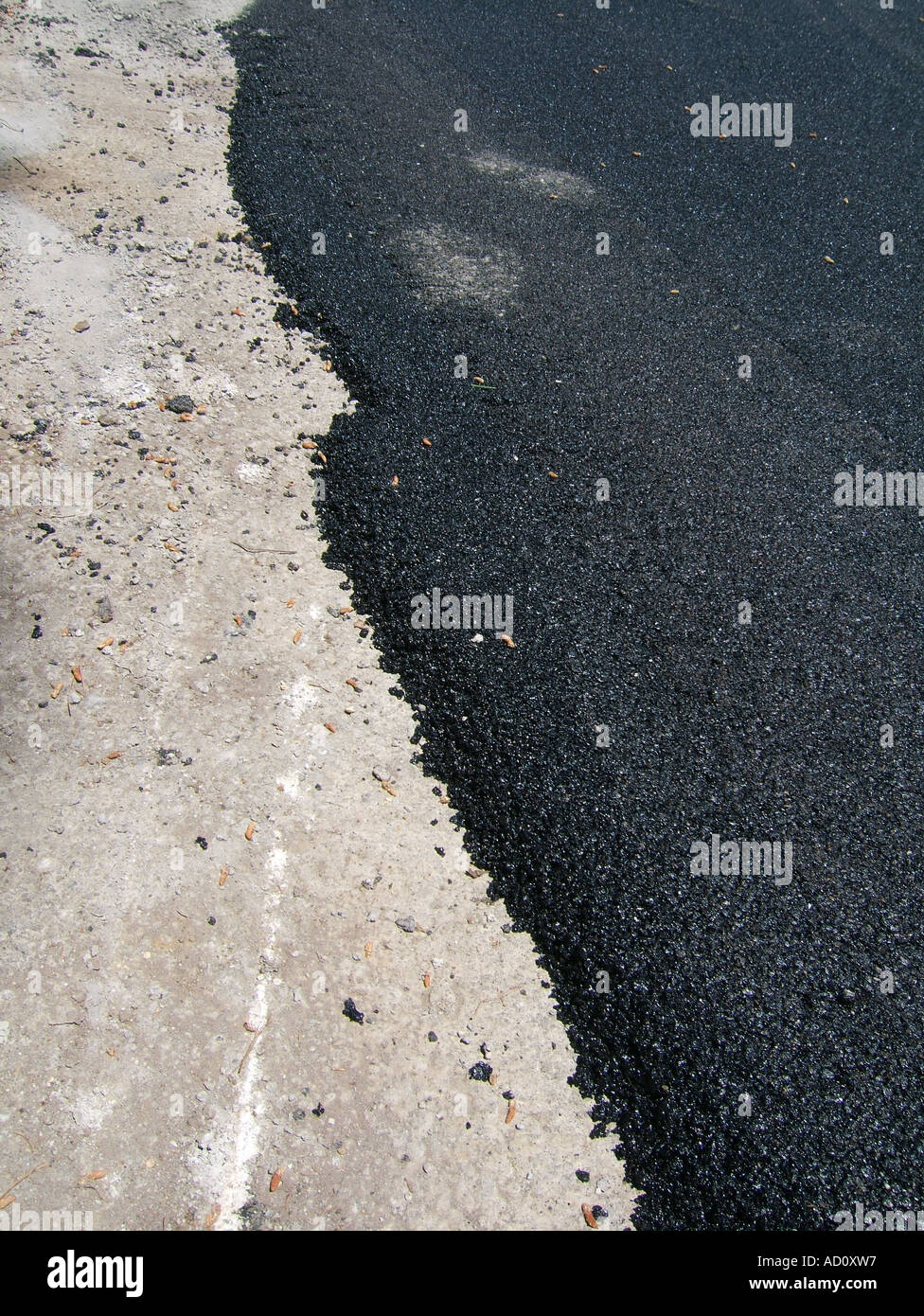 fresh tarmac on road Stock Photo - Alamy