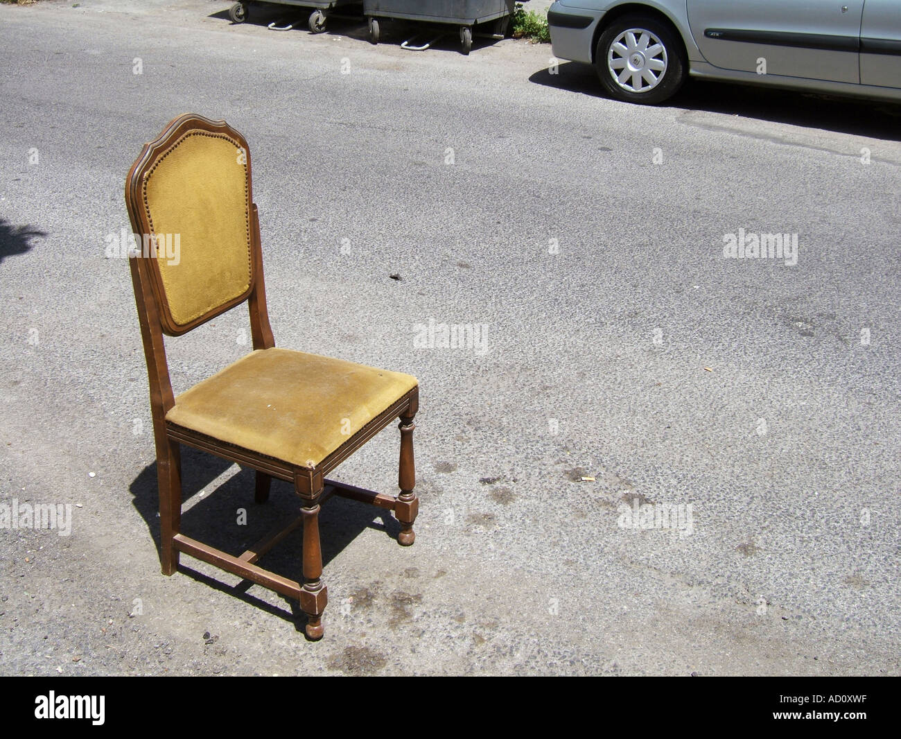 one old chair left in street Stock Photo - Alamy