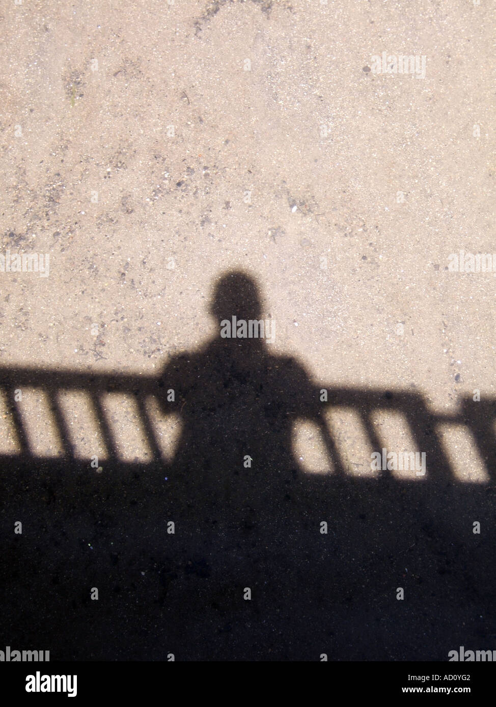 man's shadow on bridge Stock Photo - Alamy