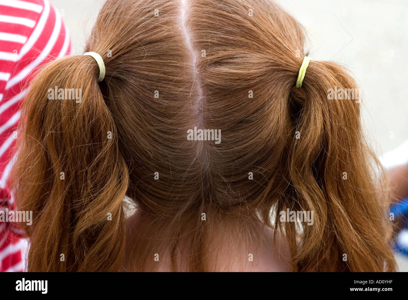 Little girl pony tail red hair Stock Photo - Alamy