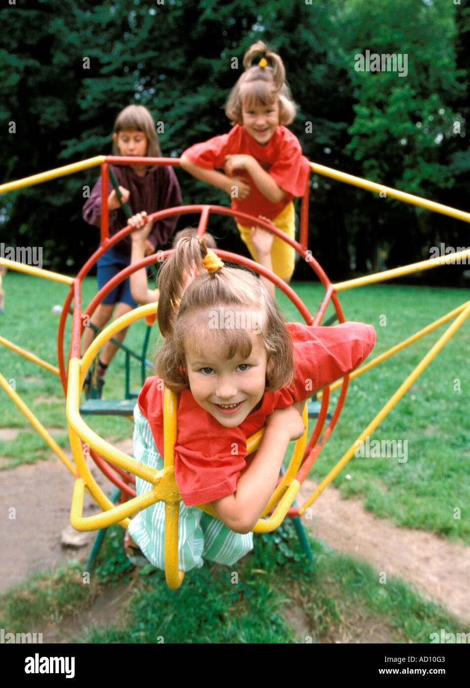 Children on playground MR8373 MR8371 Stock Photo - Alamy