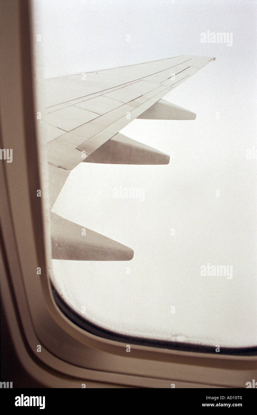 view of wing from plane window landing movement Stock Photo - Alamy