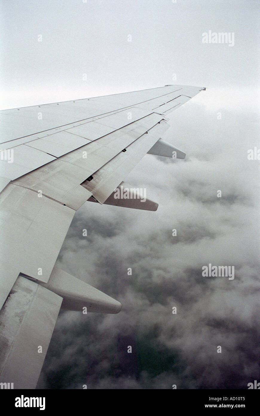 view of wing from plane window landing movement Stock Photo - Alamy