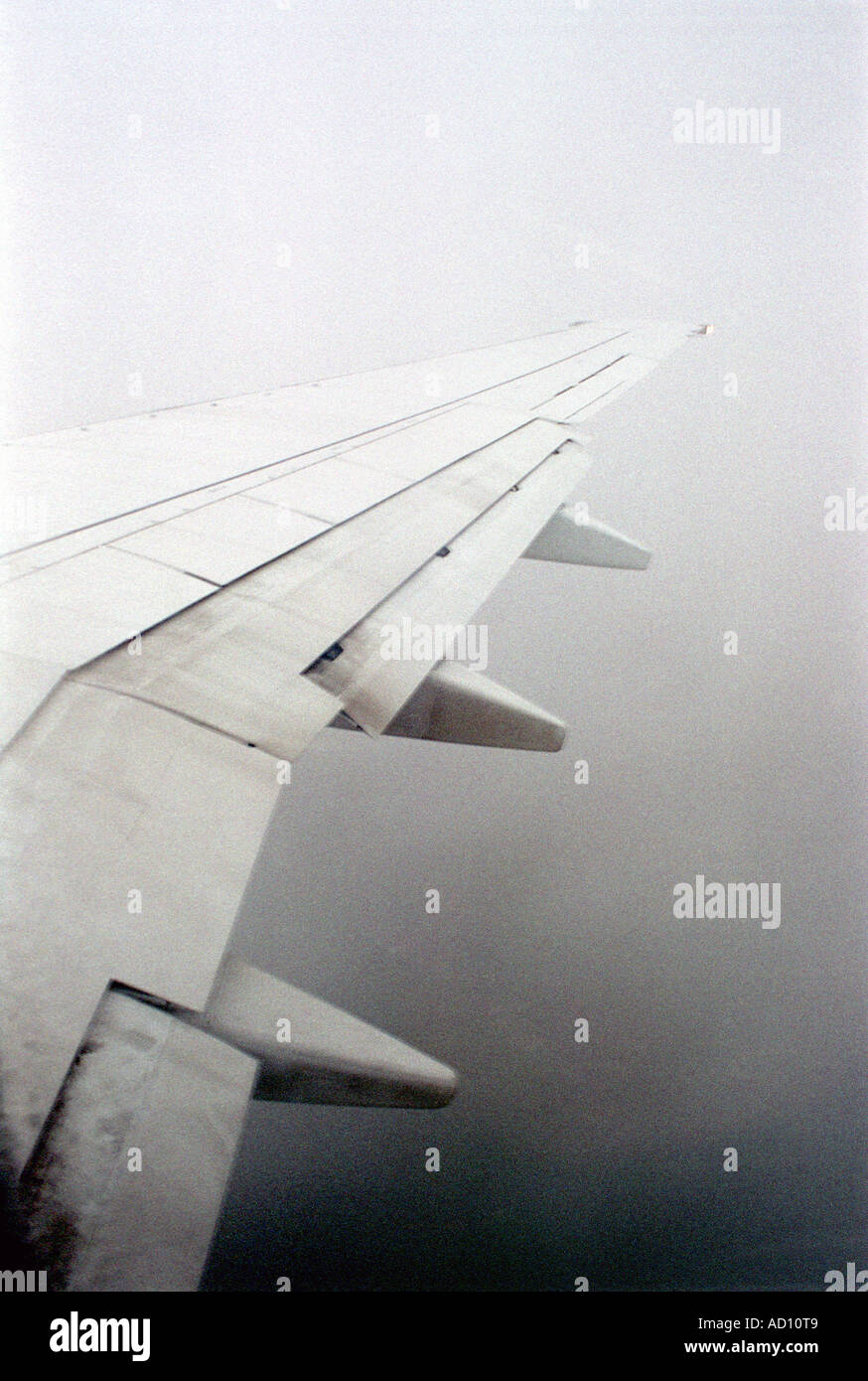view of wing from plane window landing movement Stock Photo - Alamy