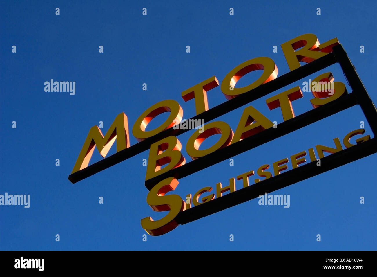 Motor boats sightseeing sign against deep blue cloudless sky, Stockholm ...