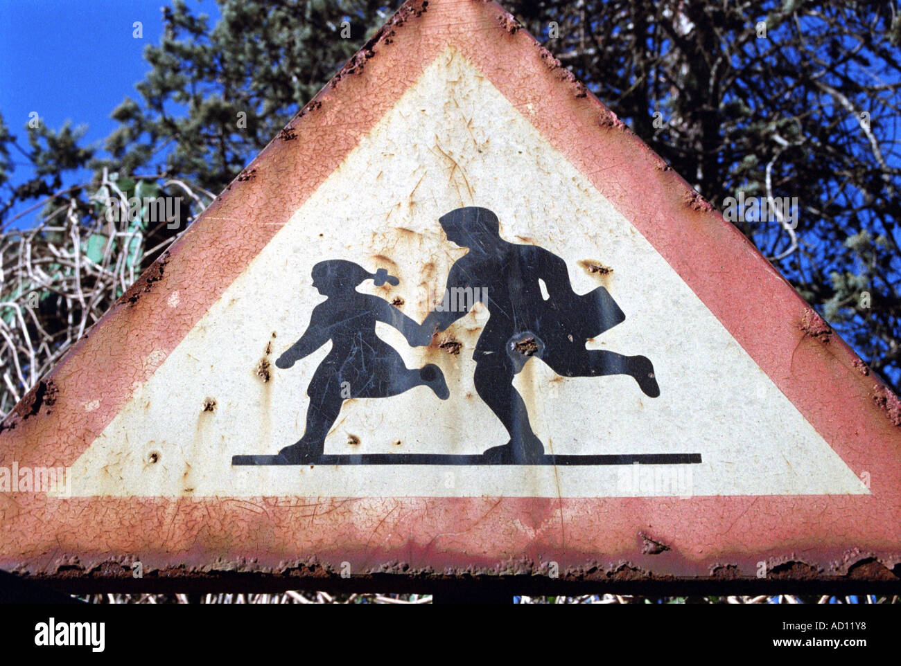 old children crossing by school road sign Stock Photo - Alamy
