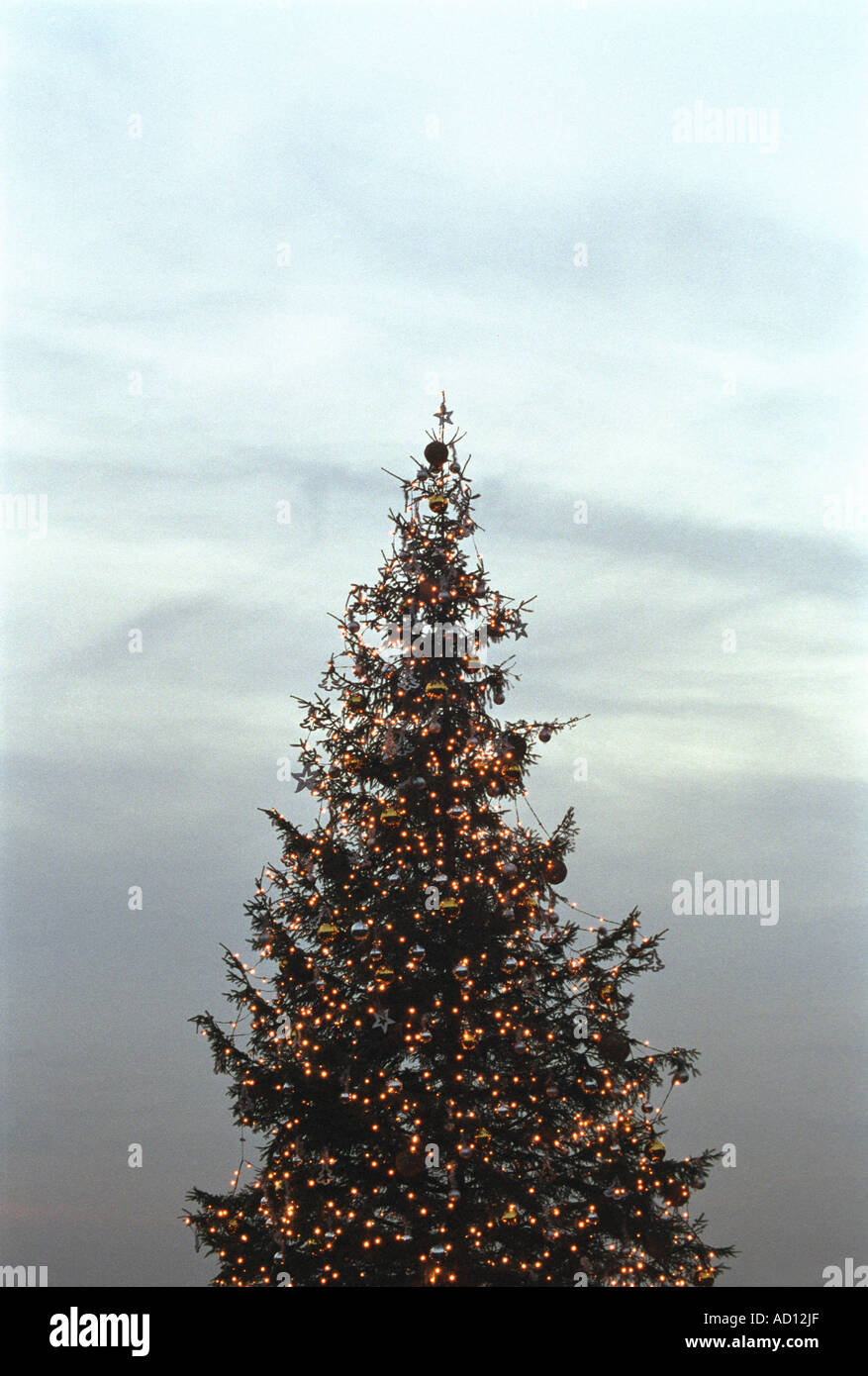 christmas tree with colourful lights at night Stock Photo - Alamy