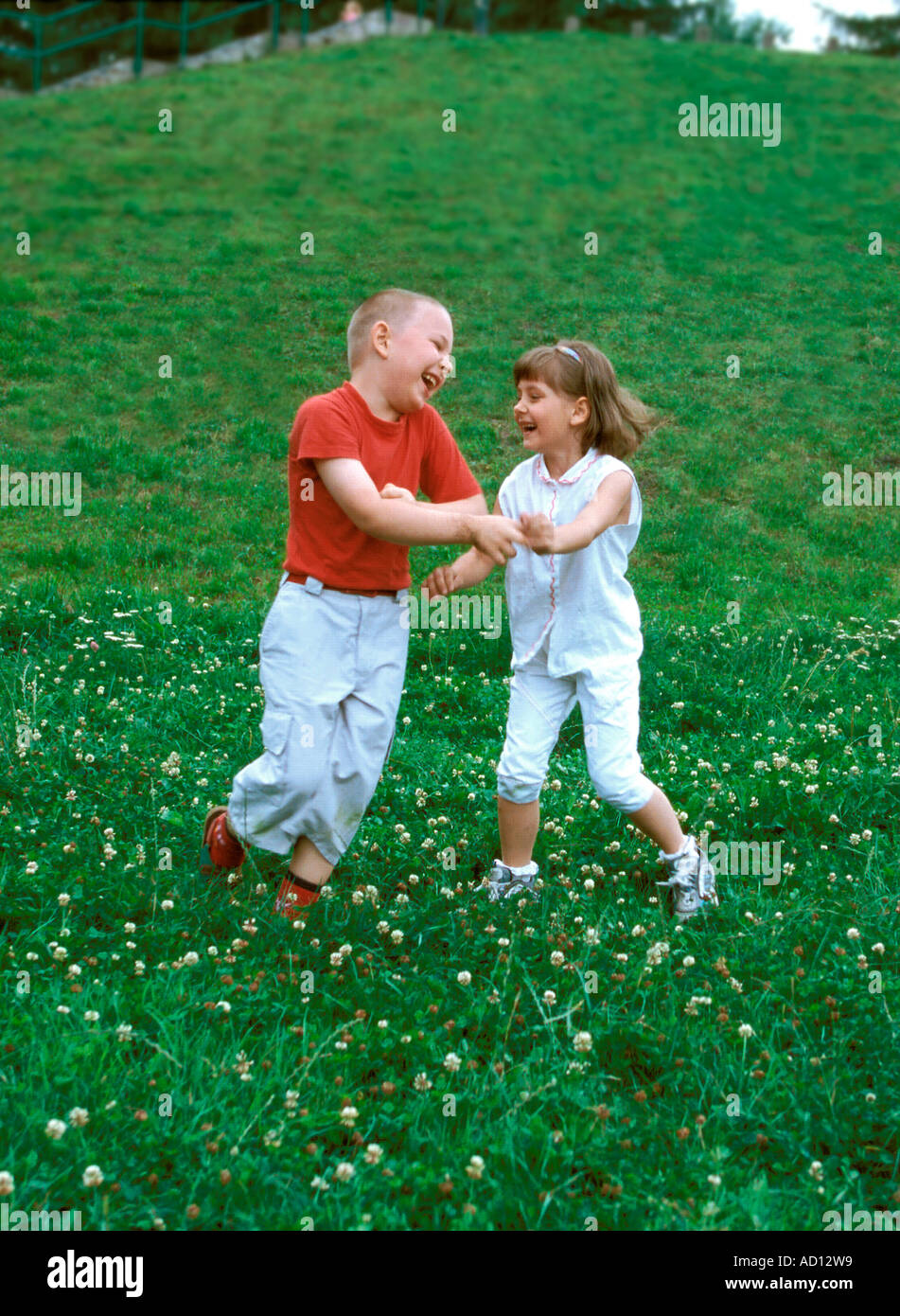 children playing together Stock Photo - Alamy