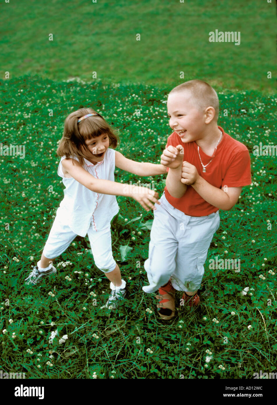 Play fighting outside pushing hi-res stock photography and images - Alamy