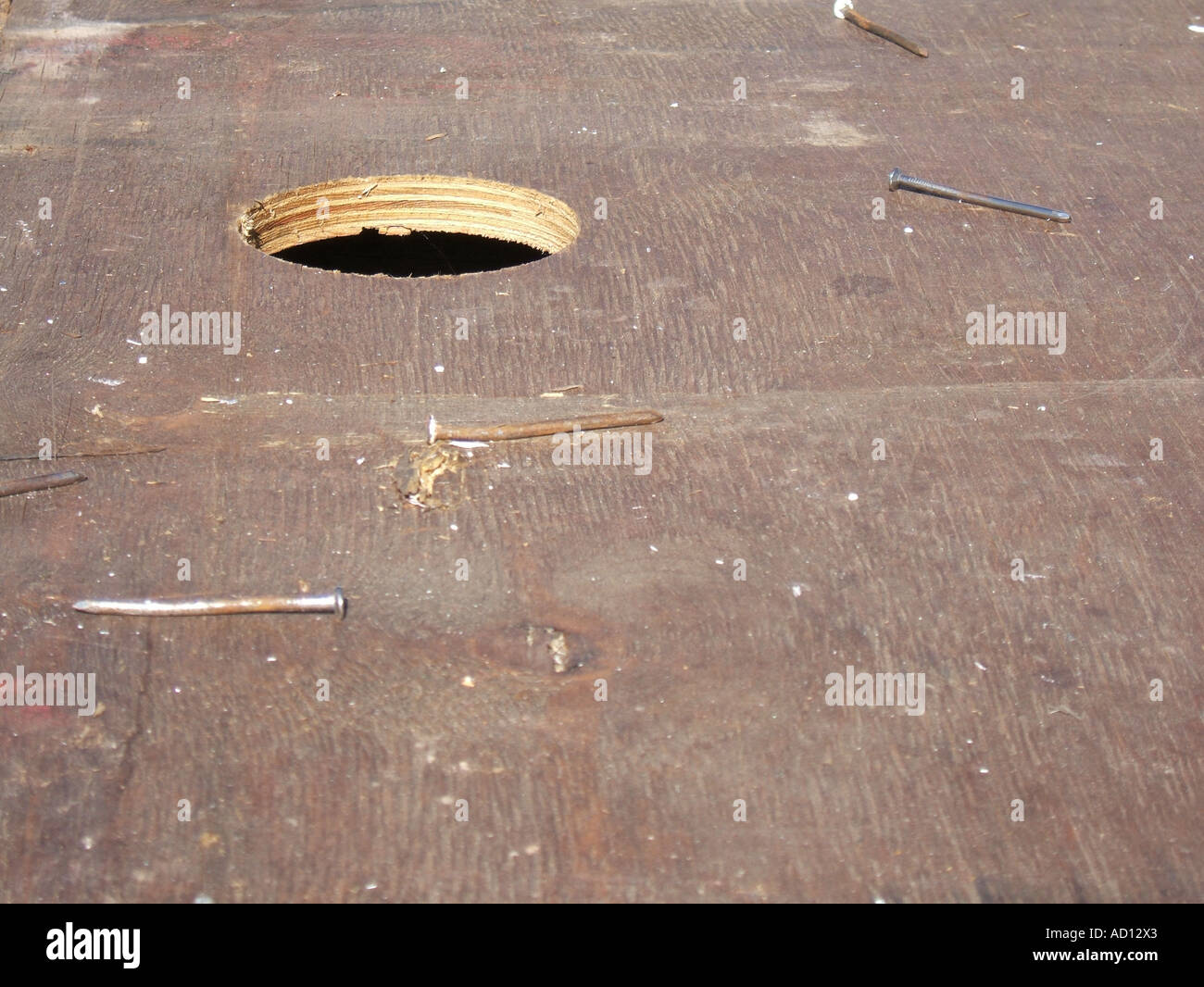 round hole in floor board Stock Photo - Alamy