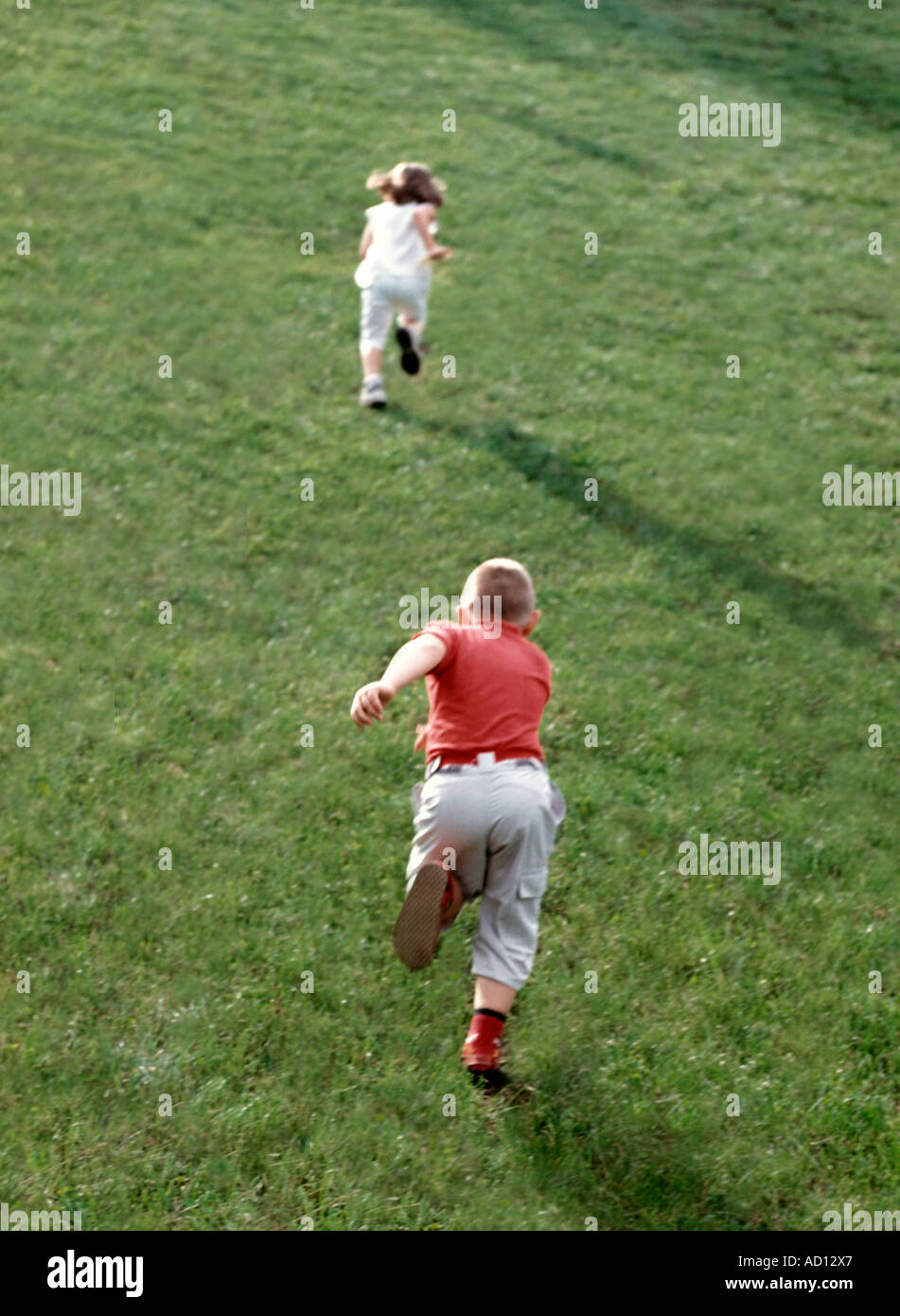 boy chasing girl Stock Photo - Alamy