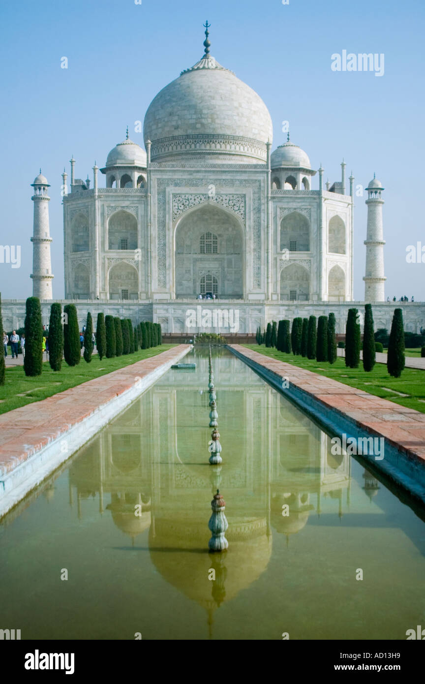 Vertical classic view of the sparkling white marble domes of the Taj ...