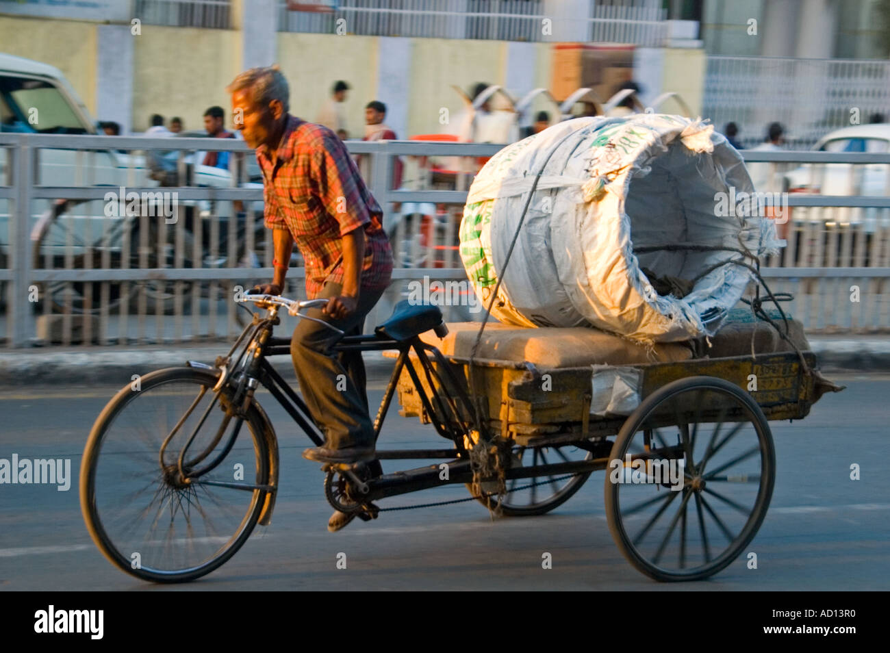 Horizontal view of a typical Indian streetscene with an Indian man ...