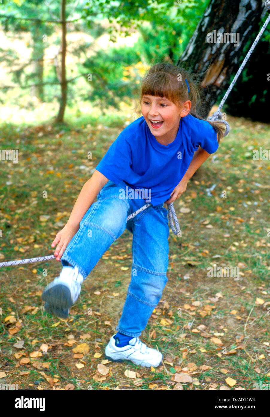 girl with rope Stock Photo - Alamy