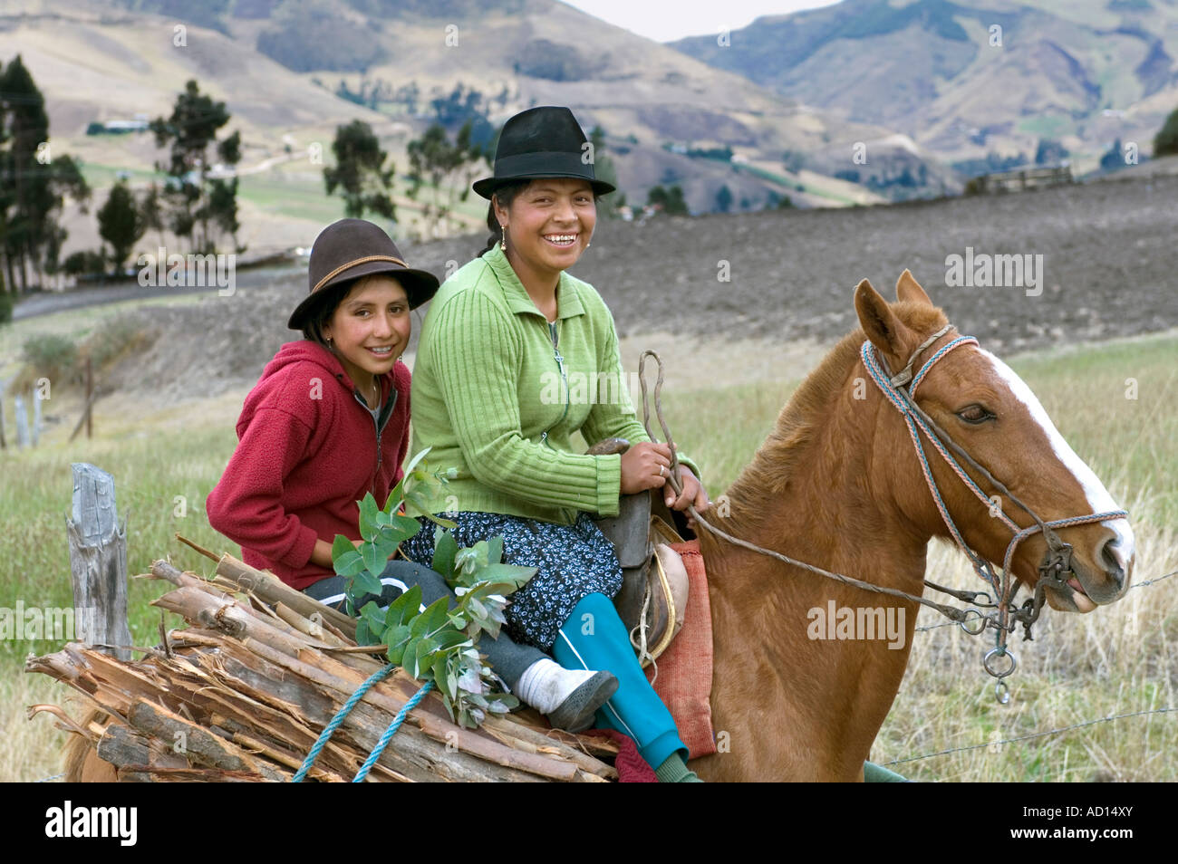Girls on horseback collecting wood, nr Cuenca, Ecuador Stock Photo - Alamy