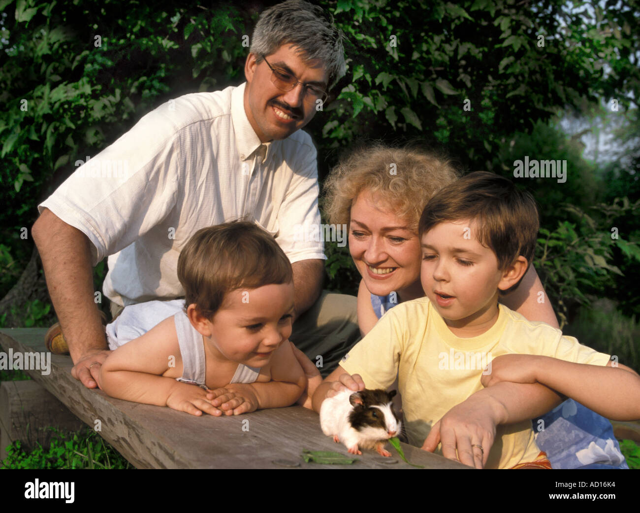 Guinea mother and son hi-res stock photography and images - Alamy