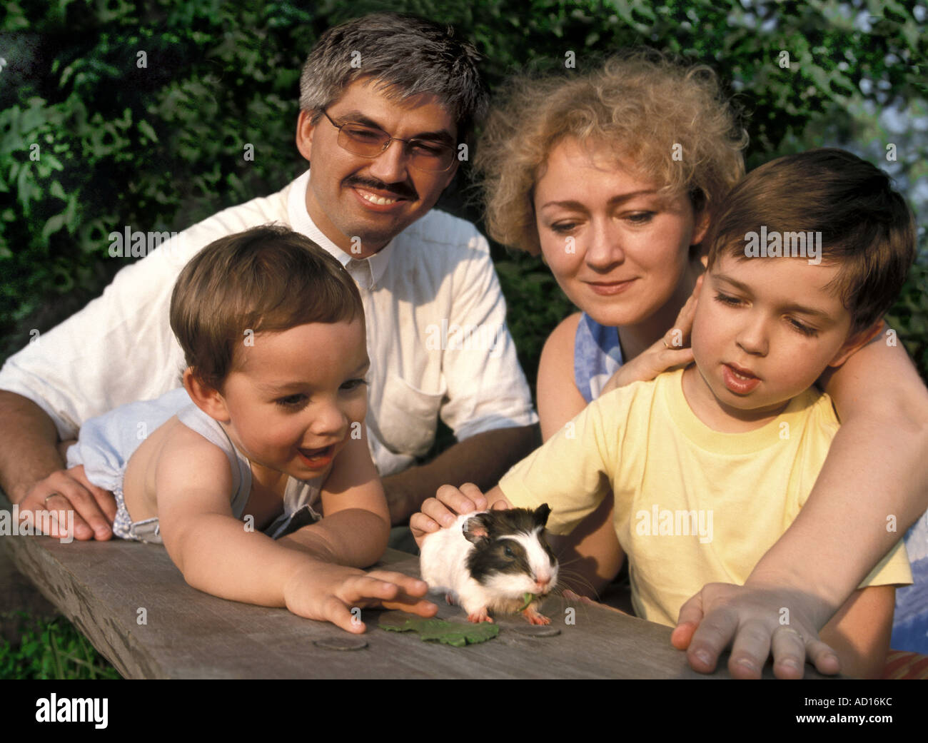 Guinea mother and son hi-res stock photography and images - Alamy
