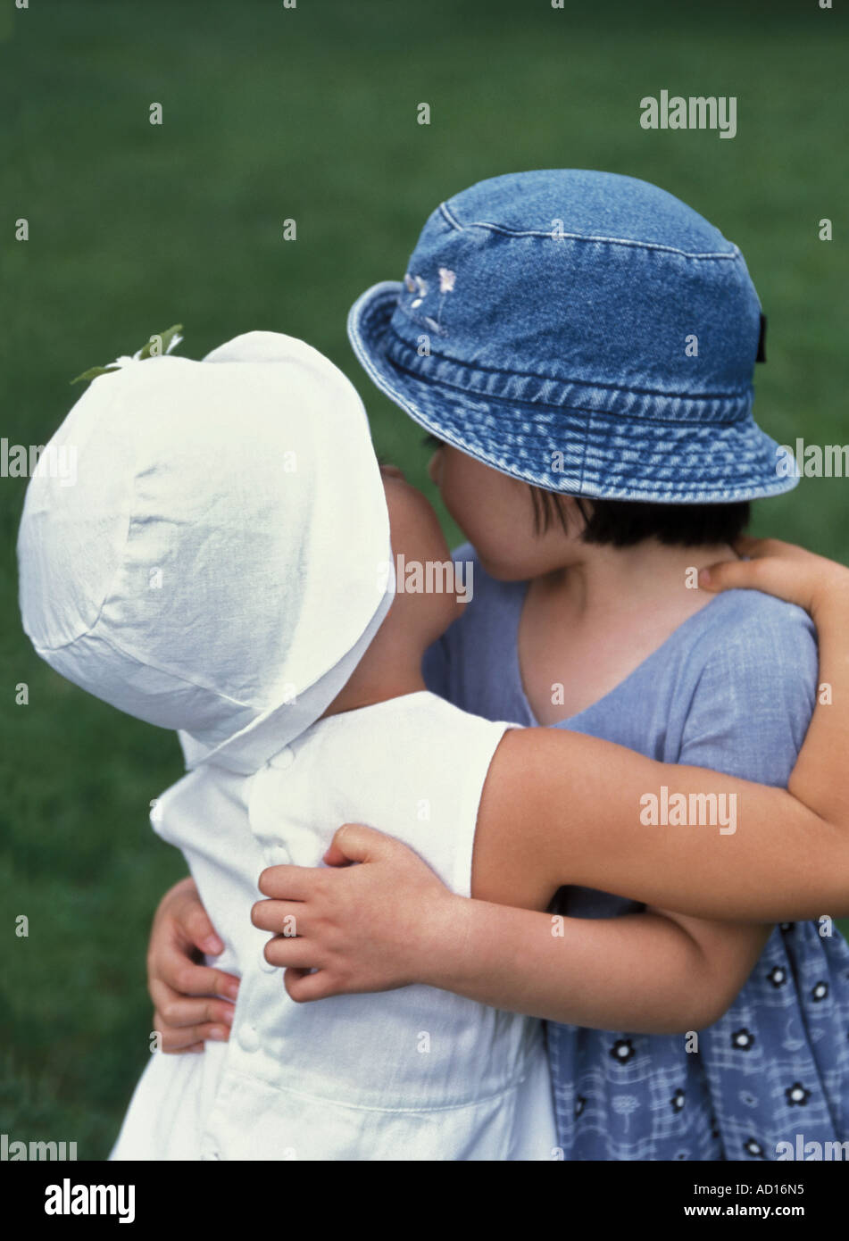 giving a hug each other Stock Photo - Alamy