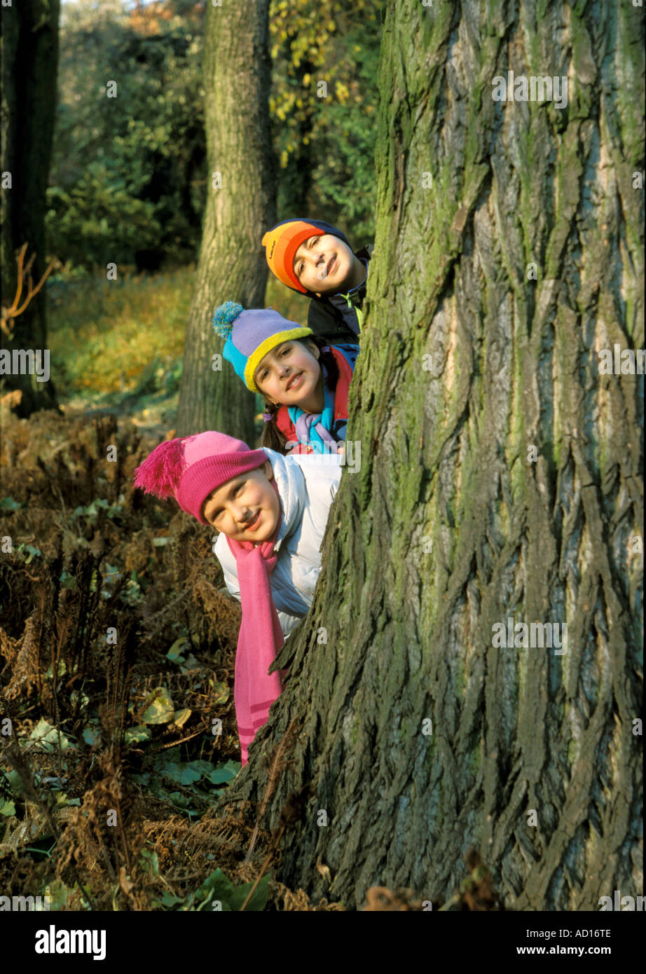 Two girls throwing leaves hi-res stock photography and images - Alamy