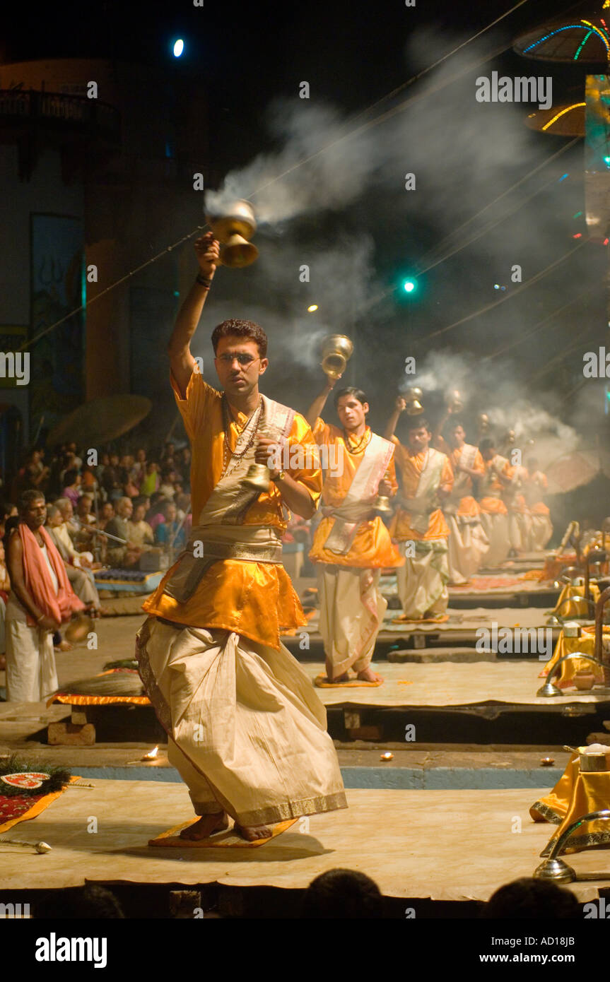 A view of aarti (prayers) being performed by young priests (pujaris) at ...