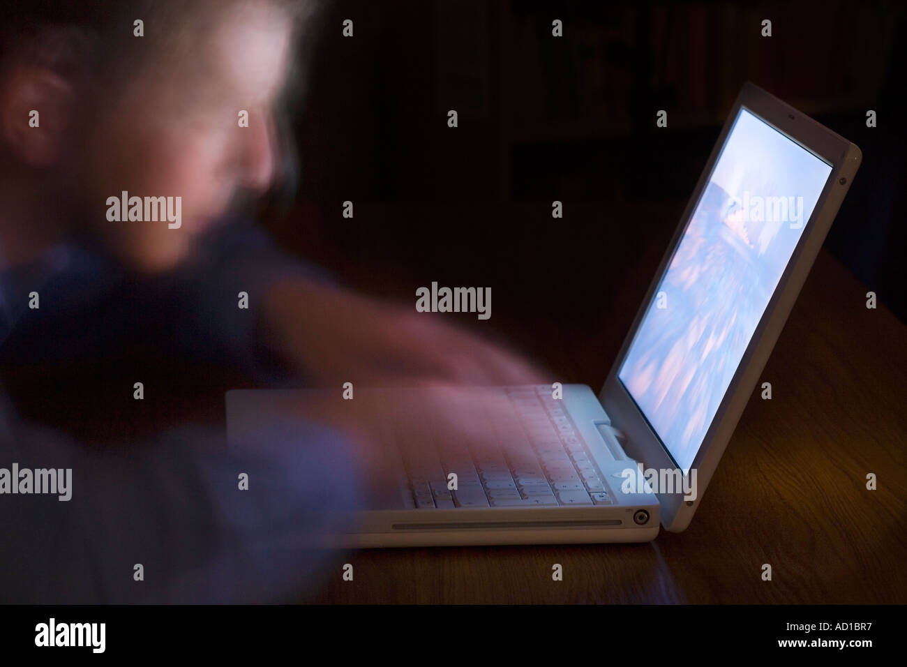 Using laptop at night hi-res stock photography and images - Alamy