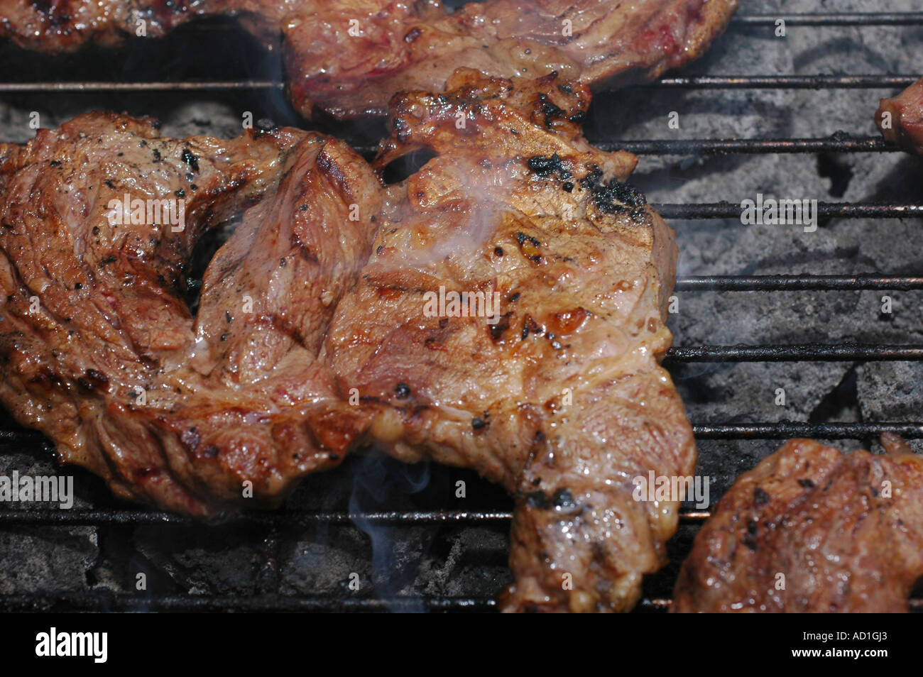 meat cooking on the barbecue Stock Photo - Alamy