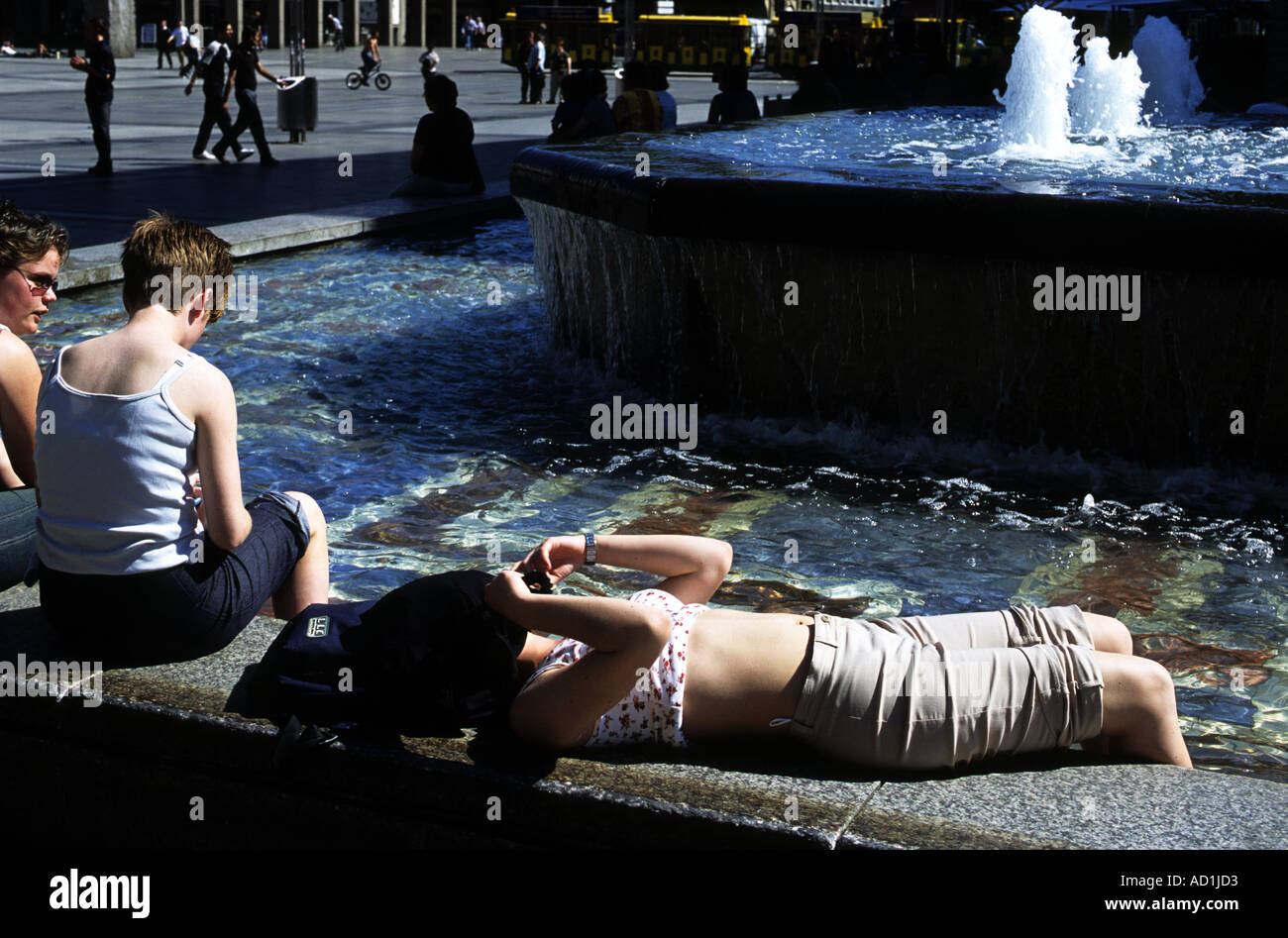 Girls cooling off in a fountain, Cologne, North Rhine-Westphalia ...