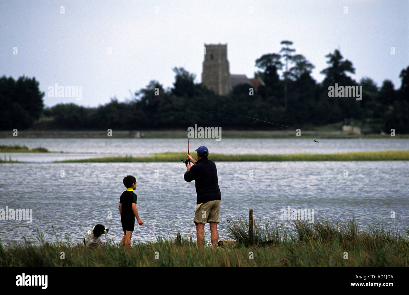 Fishing on the river Alde near Saint Botolph's church in Iken, Suffolk ...