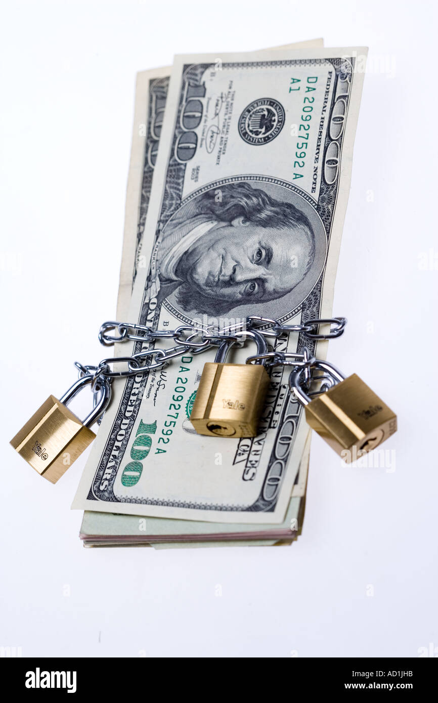 American dollar bills with padlock and chain Stock Photo - Alamy