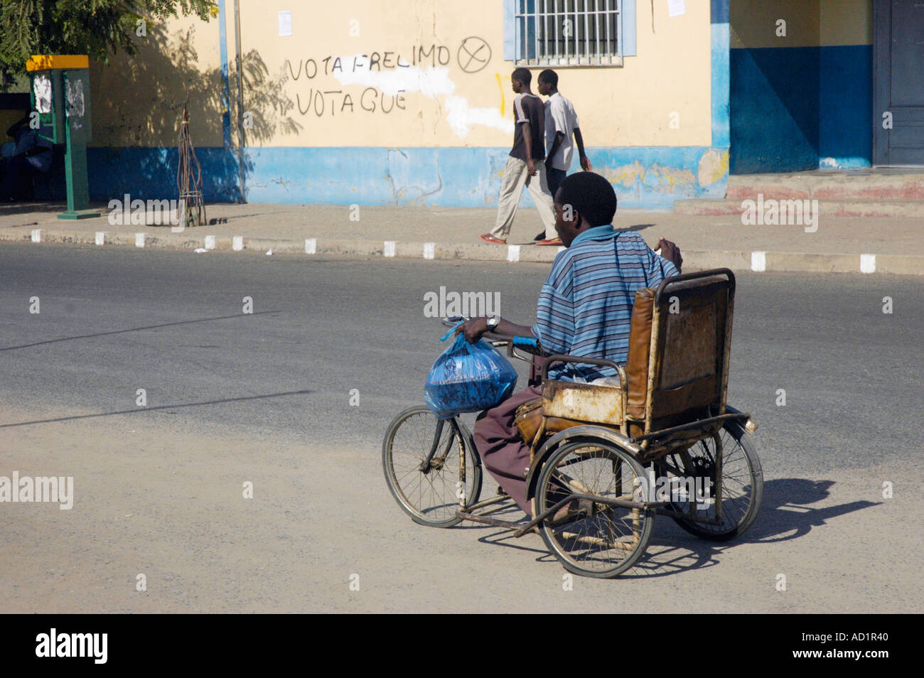 African wheelchair poverty hi-res stock photography and images - Alamy