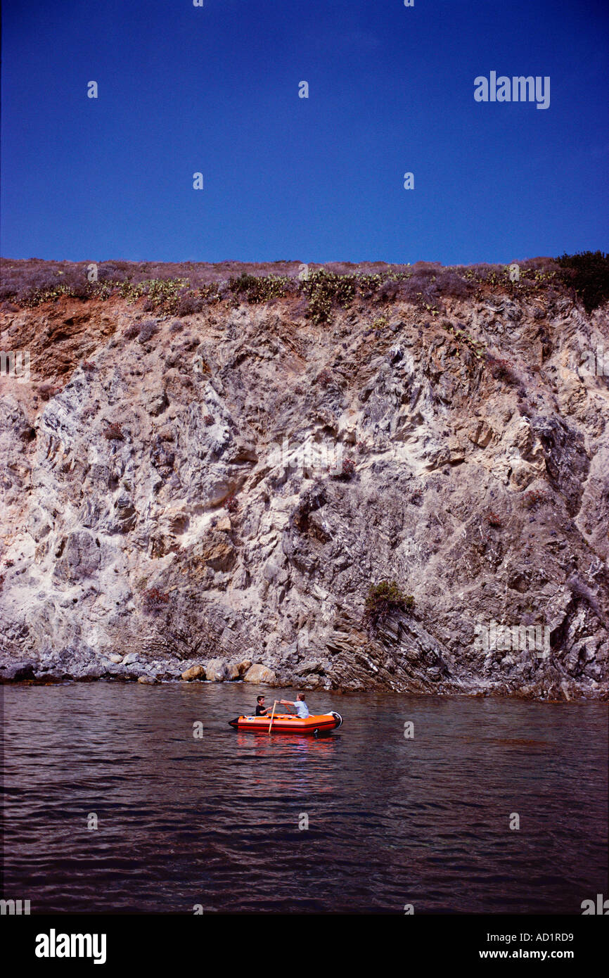 Children, 10 12 year old boy's, rowing orange dingy in Catalina Island ...