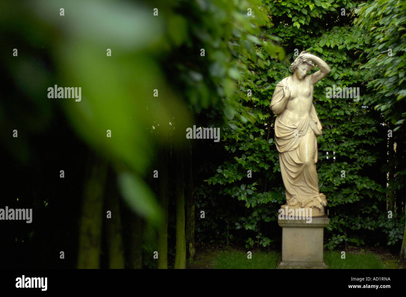 Statue in Garden Stock Photo - Alamy