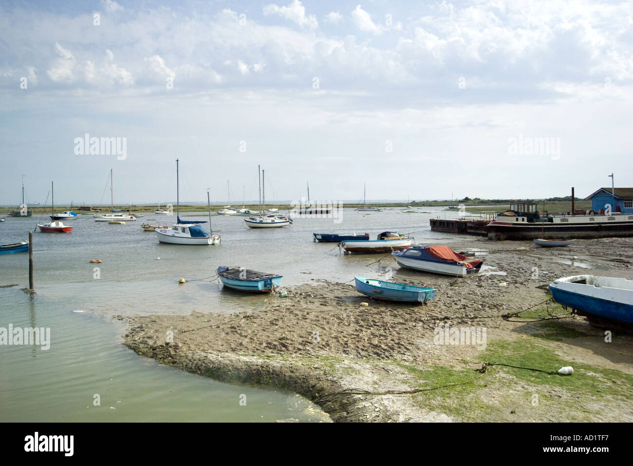 Boats in the inlet at Leigh On Sea Essex UK Stock Photo - Alamy