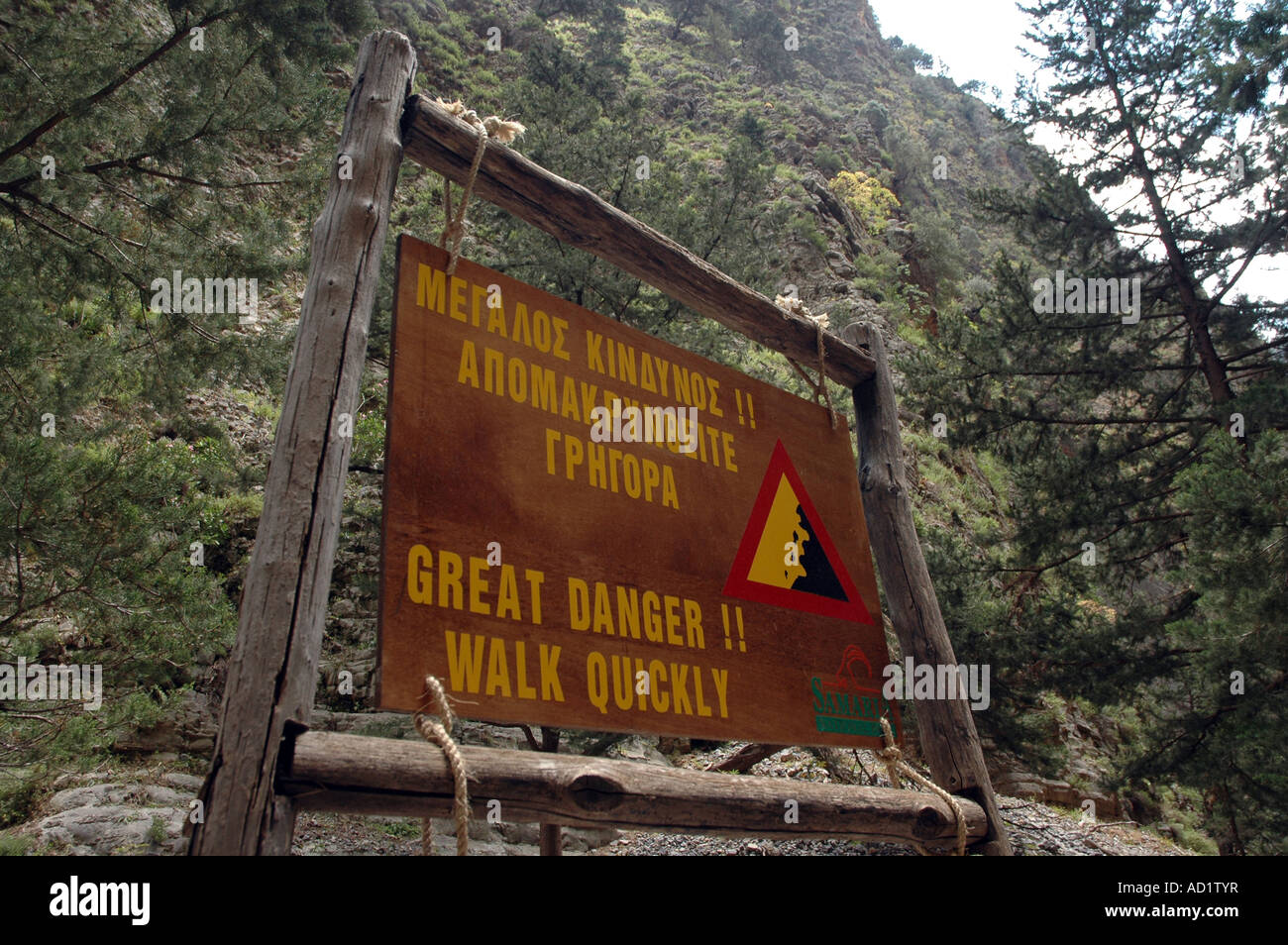 Warning sign against falling rocks in Samaria Gorge national park in ...