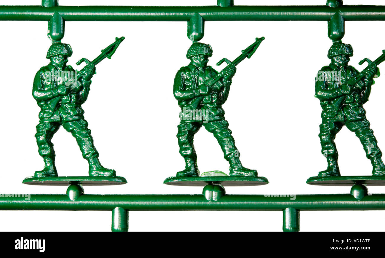 Green injection molded plastic toy model soldiers Stock Photo - Alamy
