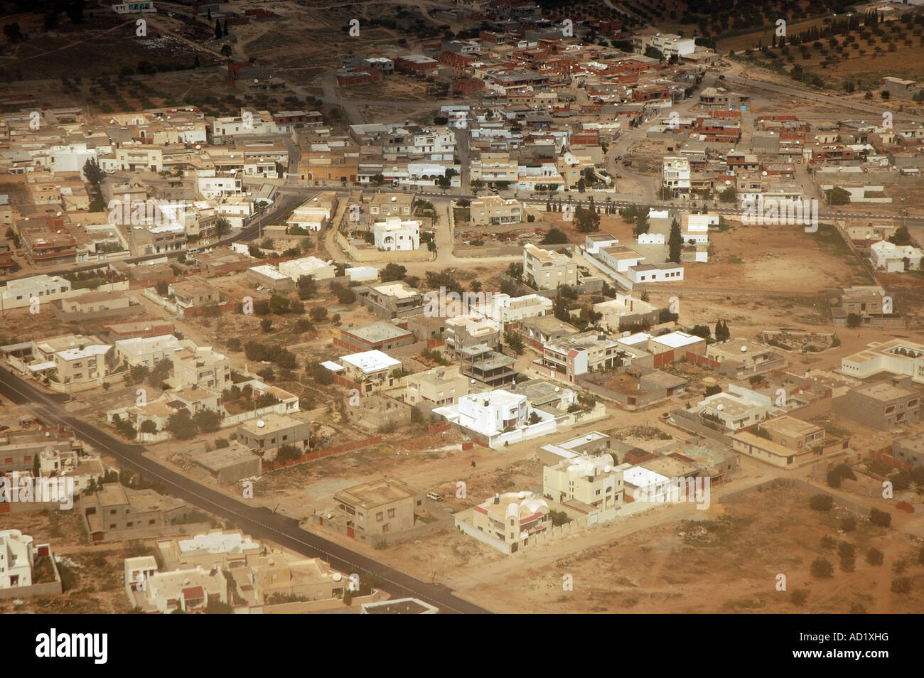 Monastir city in Tunisia seen during landing approach, view from plane ...