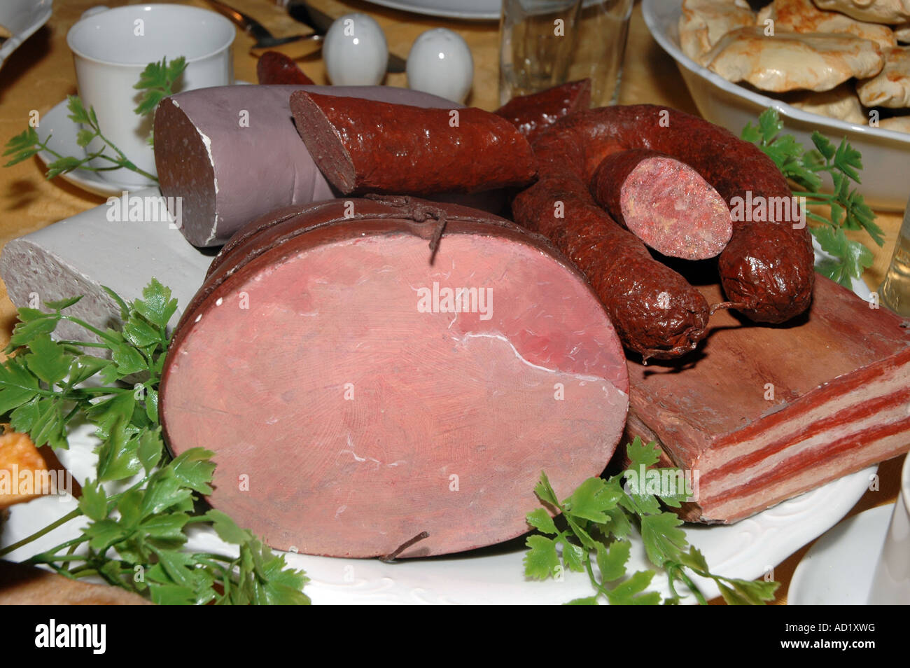 Plastic imitation of traditional polish cuisine. Ham, sausage and bacon ...