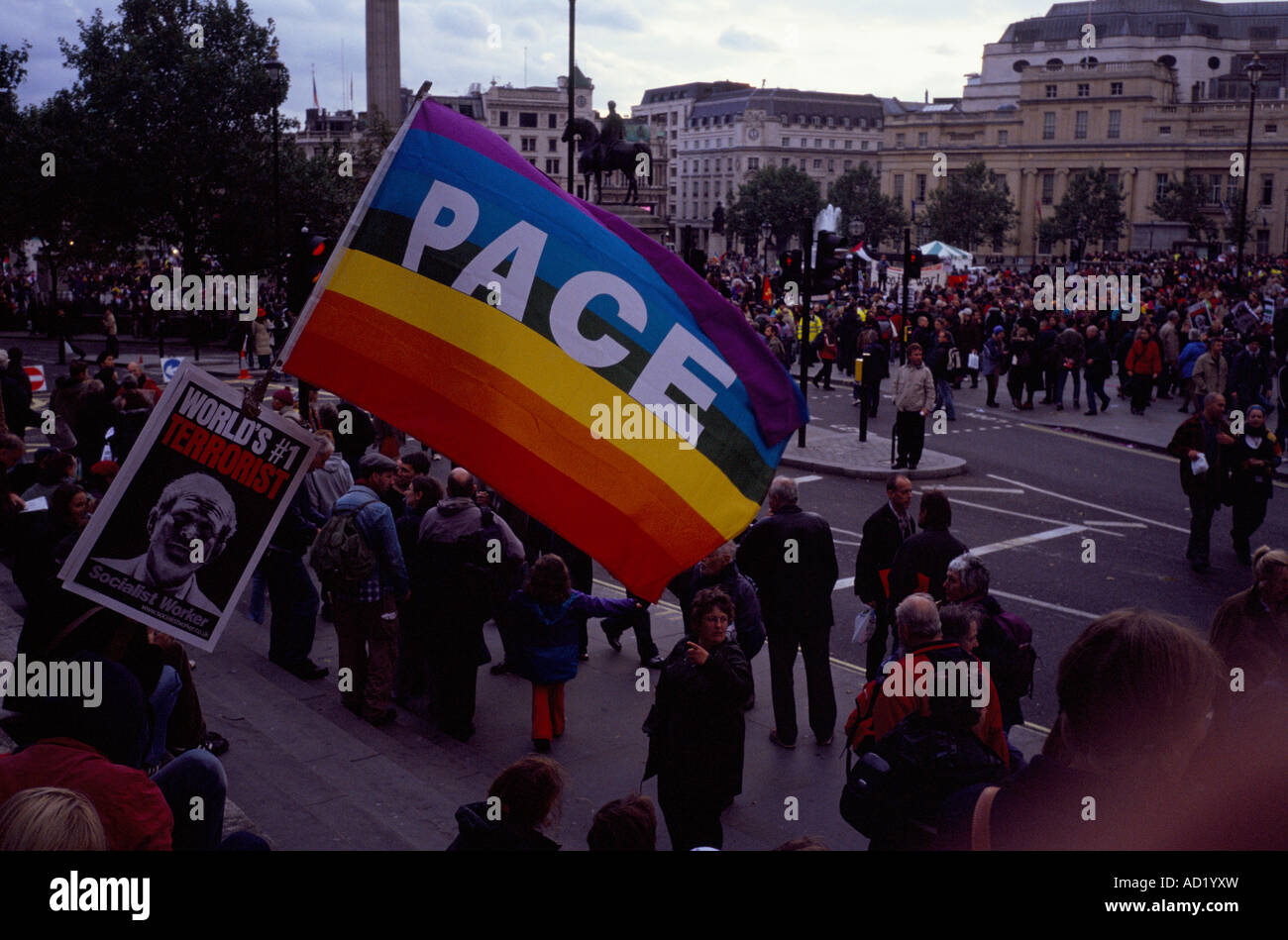 Pace rainbow flag and anti bush poster at the Pace peace rally Stock ...