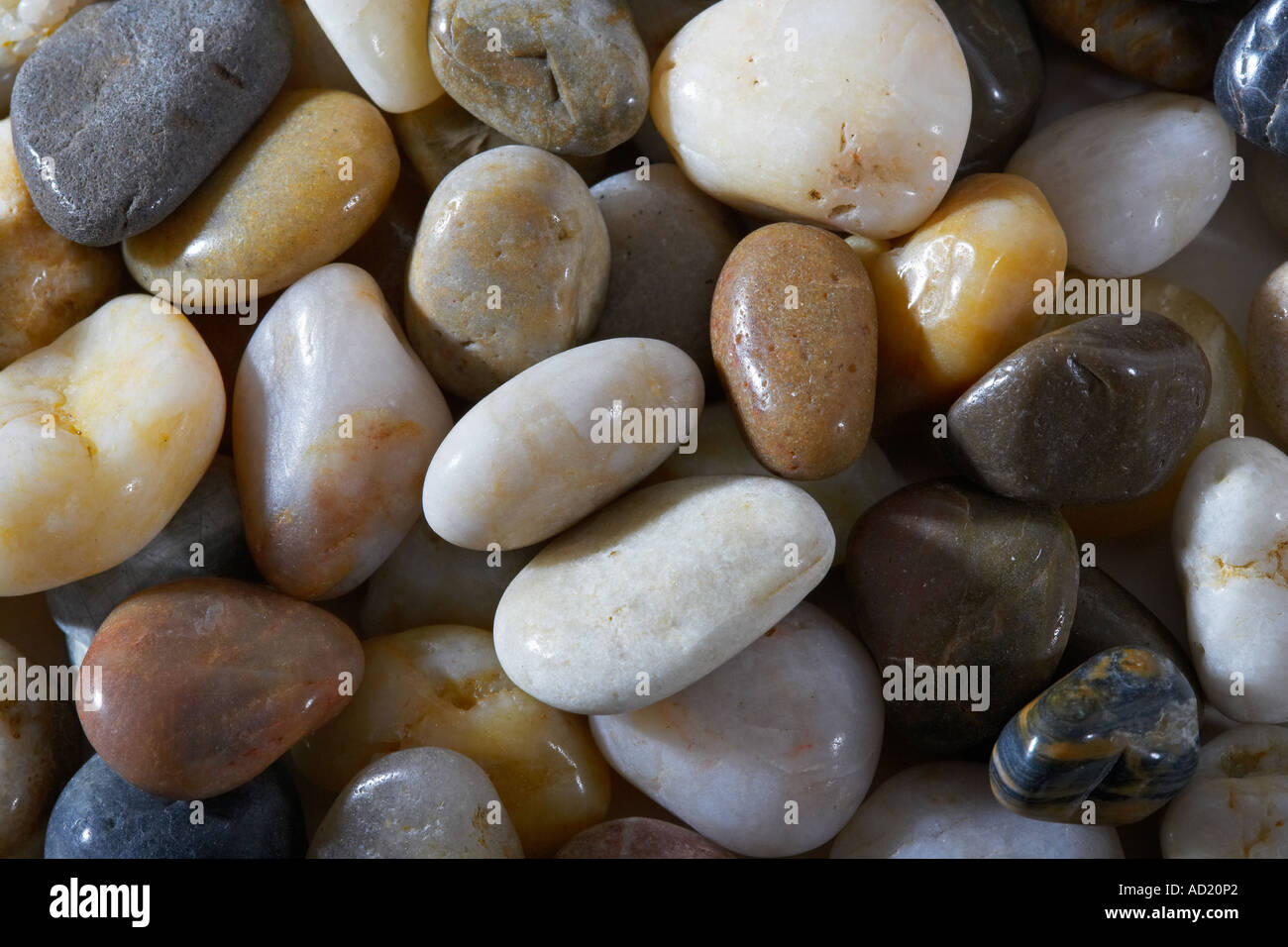 Coloured Pebbles on a Beach Stock Photo - Alamy