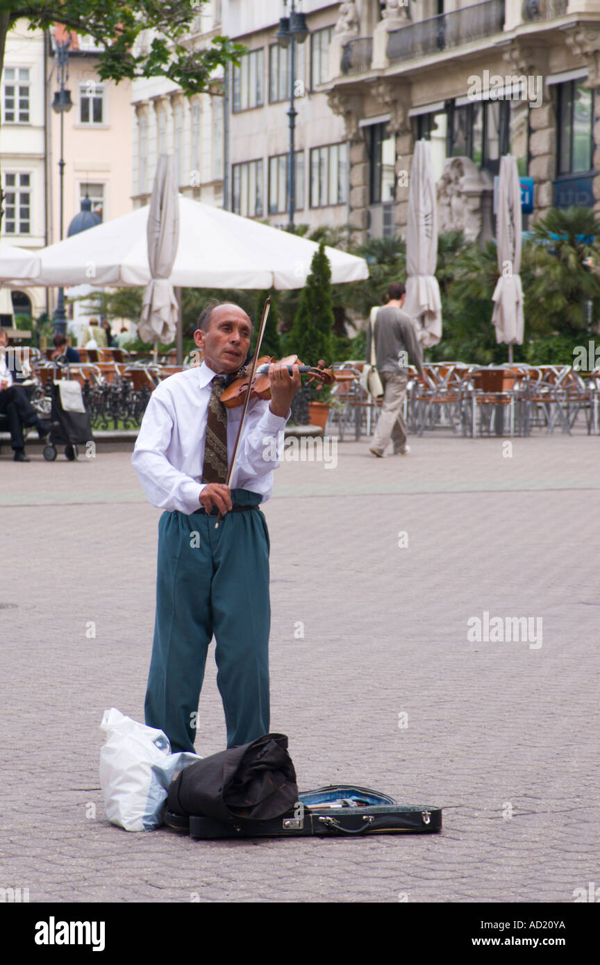 A traditional gypsy fiddler busking in Budapest s main shopping zone ...