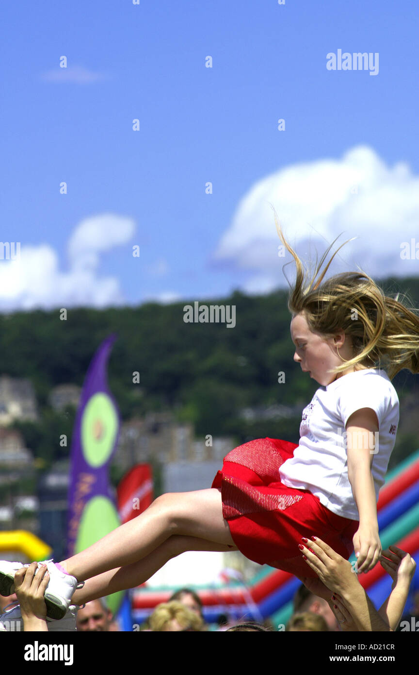 young cheerleader on the show falling down Stock Photo - Alamy