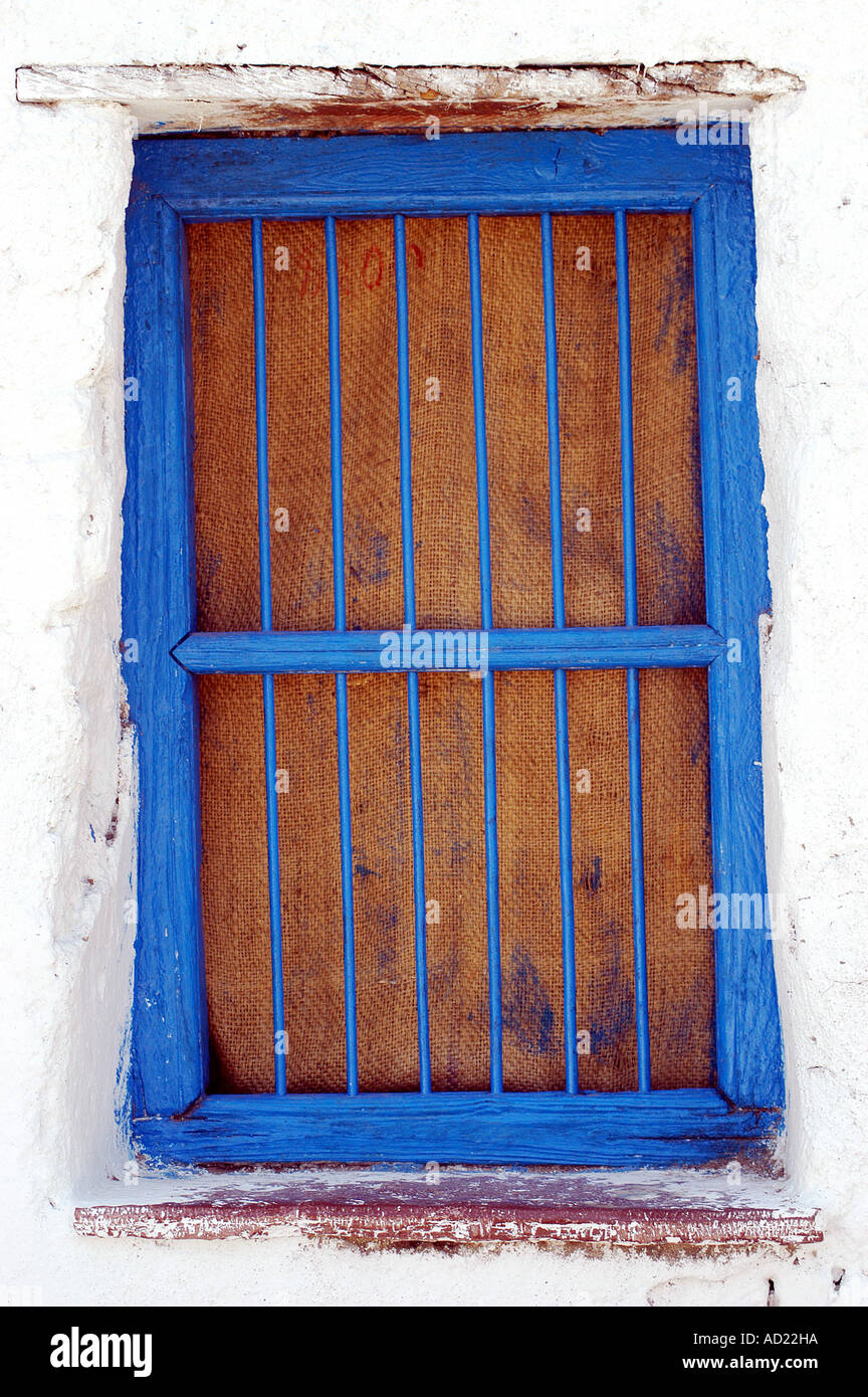 ASB73170 A blue window frame made of teak wood at Ponnari village ...