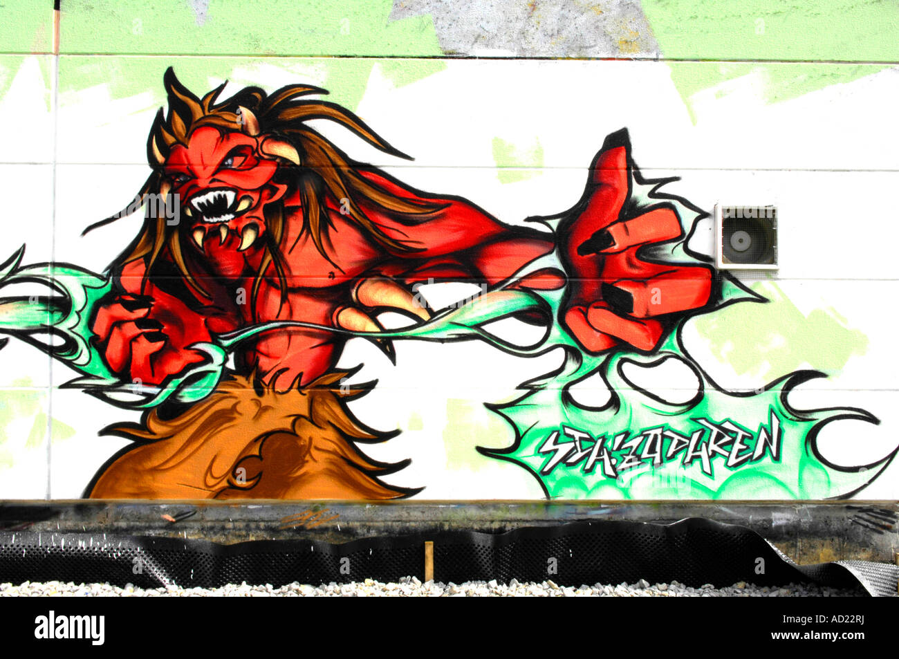 Graffiti red demon devil monstrous hi-res stock photography and images ...